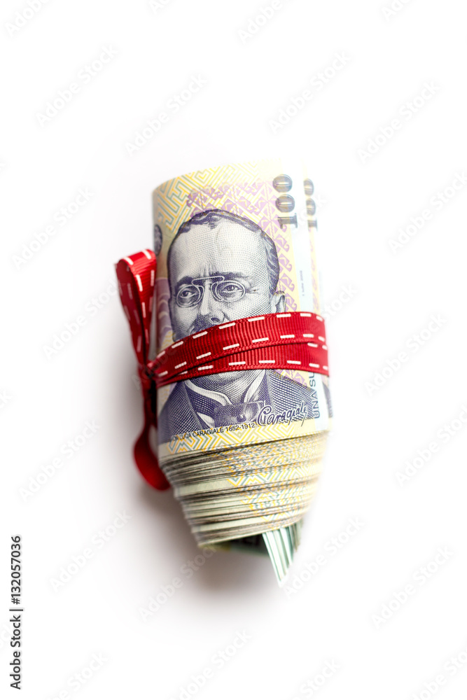 Roll of money isolated on white background with red ribbon, Romanian ...