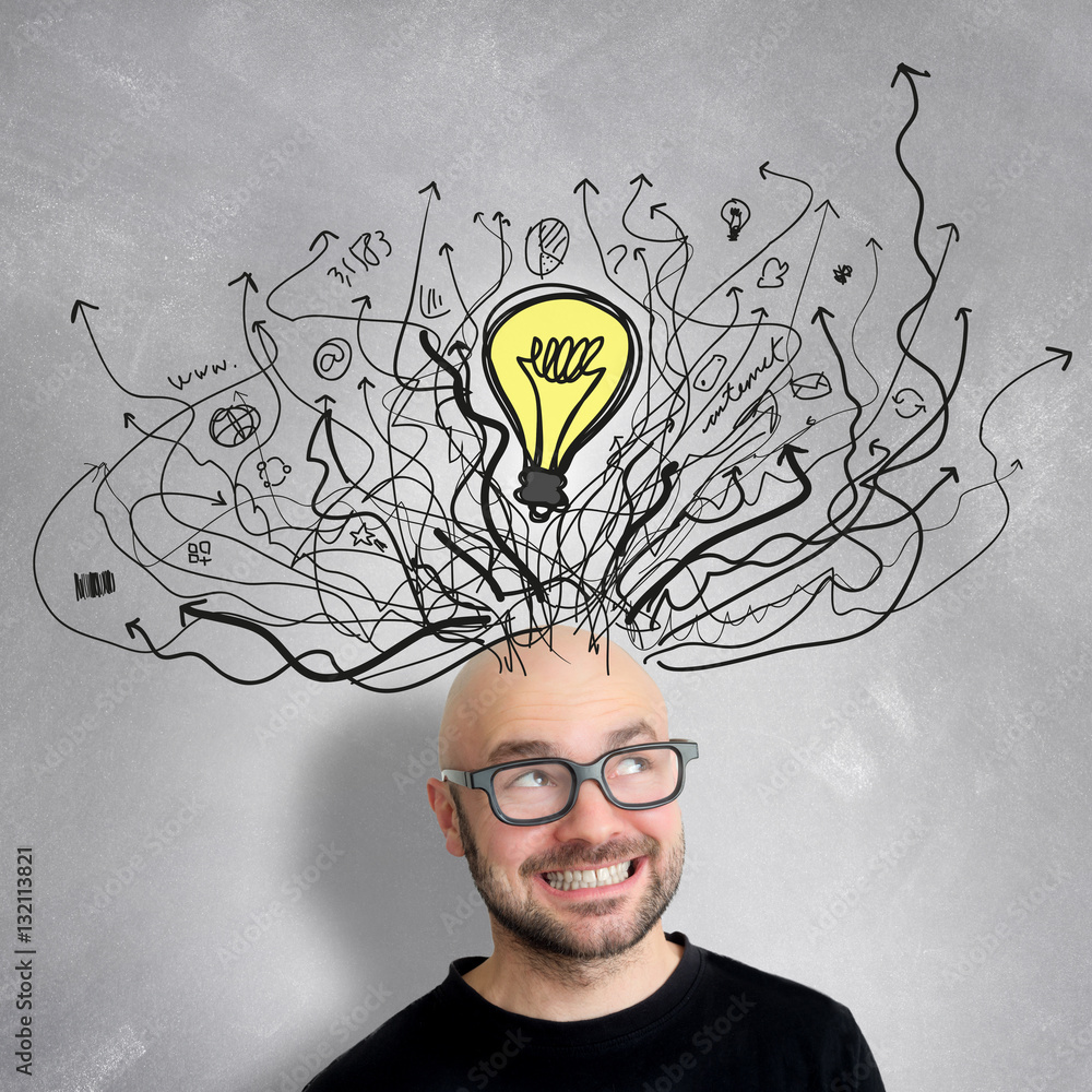 Young attractive smiling geek man with brainstormaing arrow over Stock ...