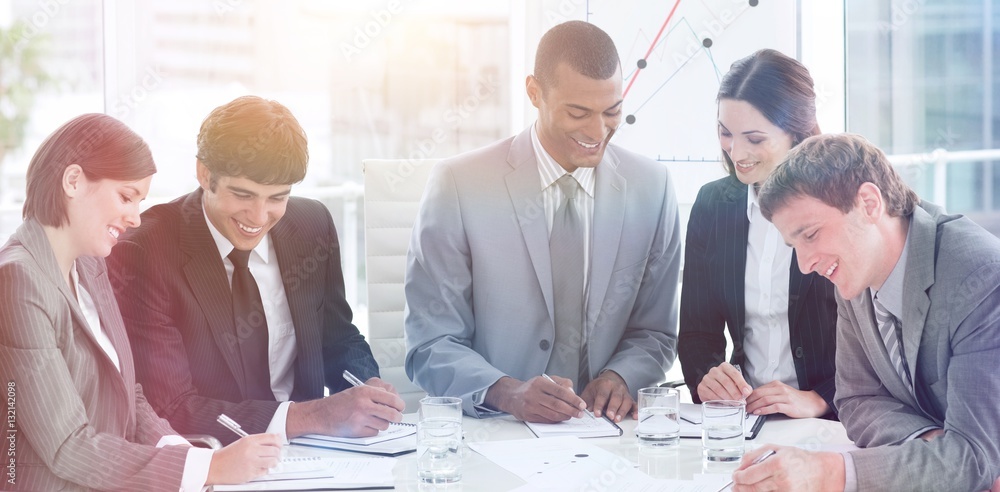 A diverse business group studying a budget plan Stock-Foto | Adobe Stock