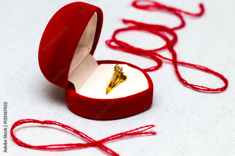 Love you words and heart symbol made of red thread on a white fo Stock ...