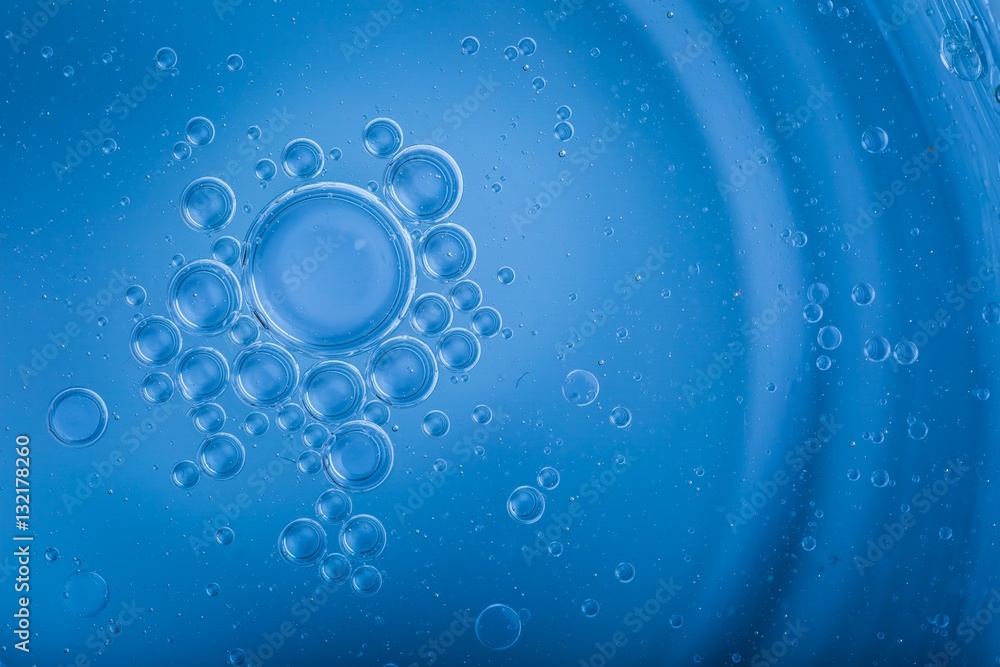 Oil droplets on water surface Stock Photo | Adobe Stock