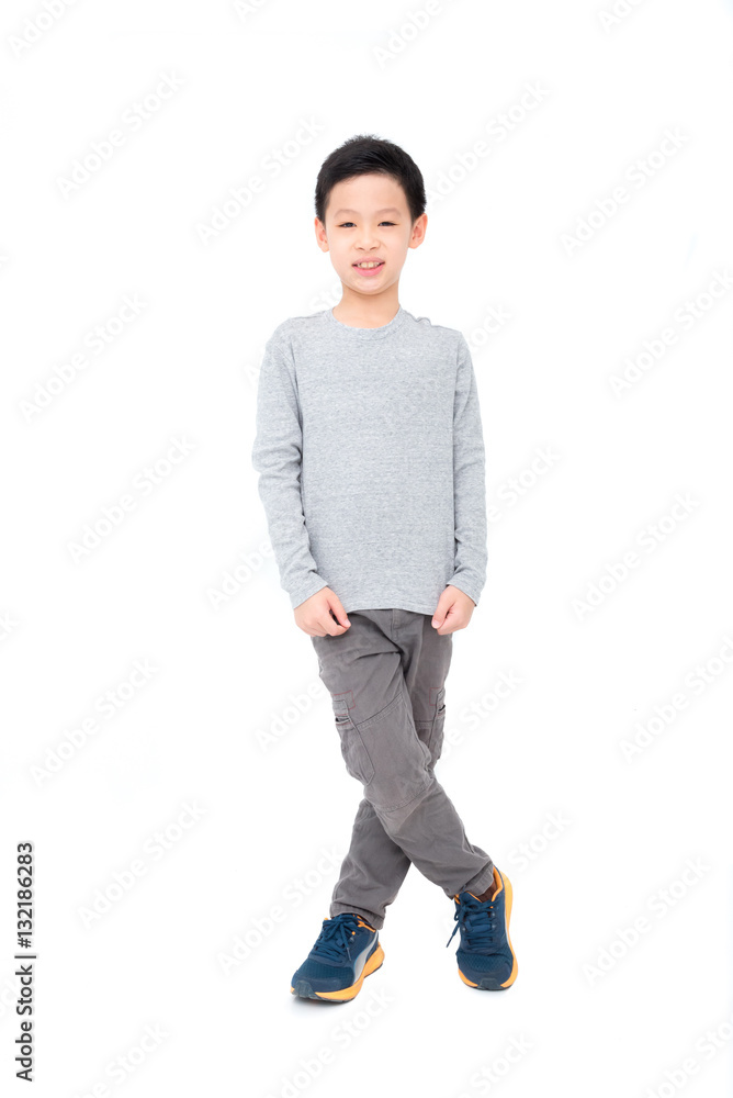 Young asian boy standing over white background Stock Photo | Adobe Stock