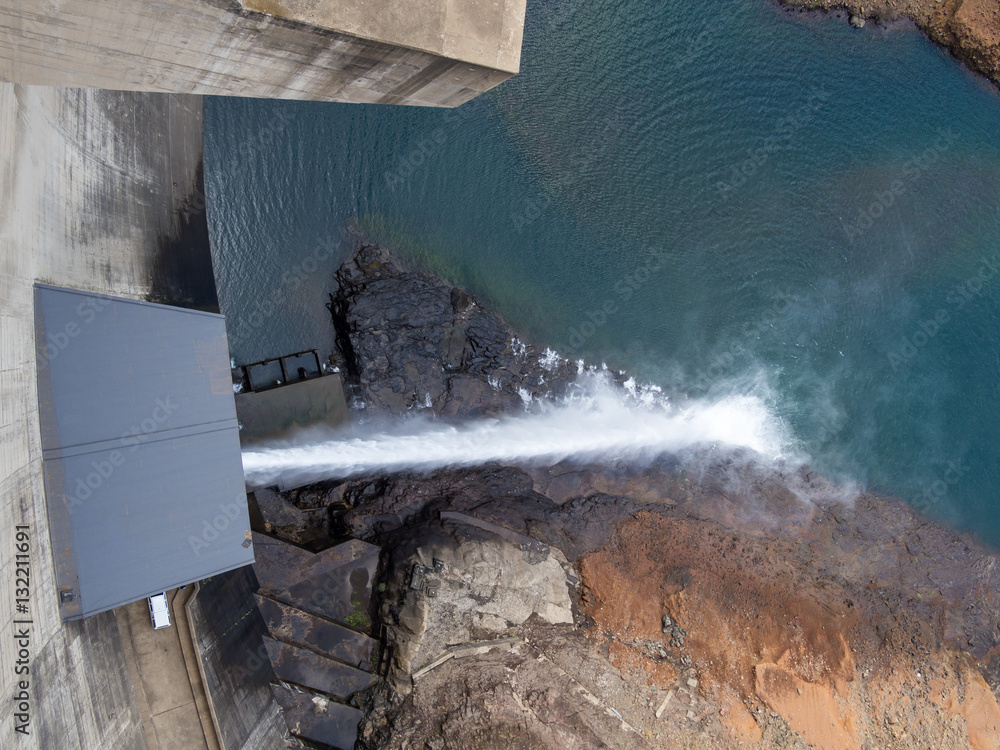 Release of water at impressive Katse Dam hydroelectric power plant in ...
