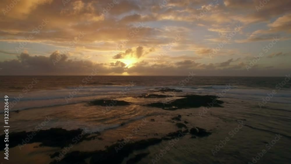 Flying over the ocean moving from the coast to deep water. Scenic ...