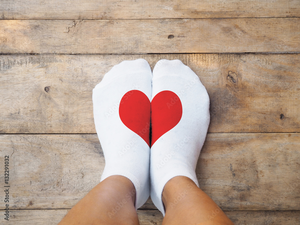 feet wearing white socks with red heart shape Stock Photo | Adobe Stock
