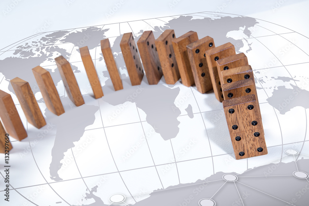 domino effect risk around world map concept background Stock Photo ...