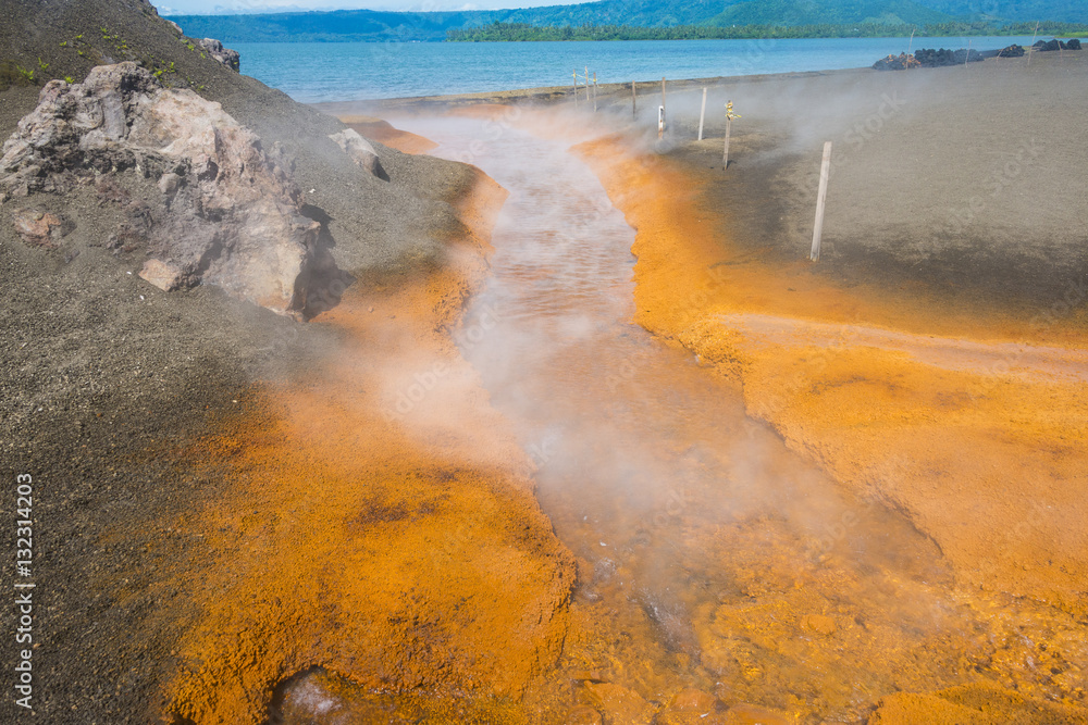 Sulphur river below Volcano Tavurvur, Rabaul, East New Britain, Papua ...