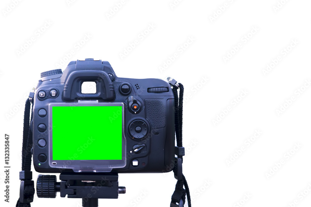 Digital single-lens reflex camera with green screen display stand on ...