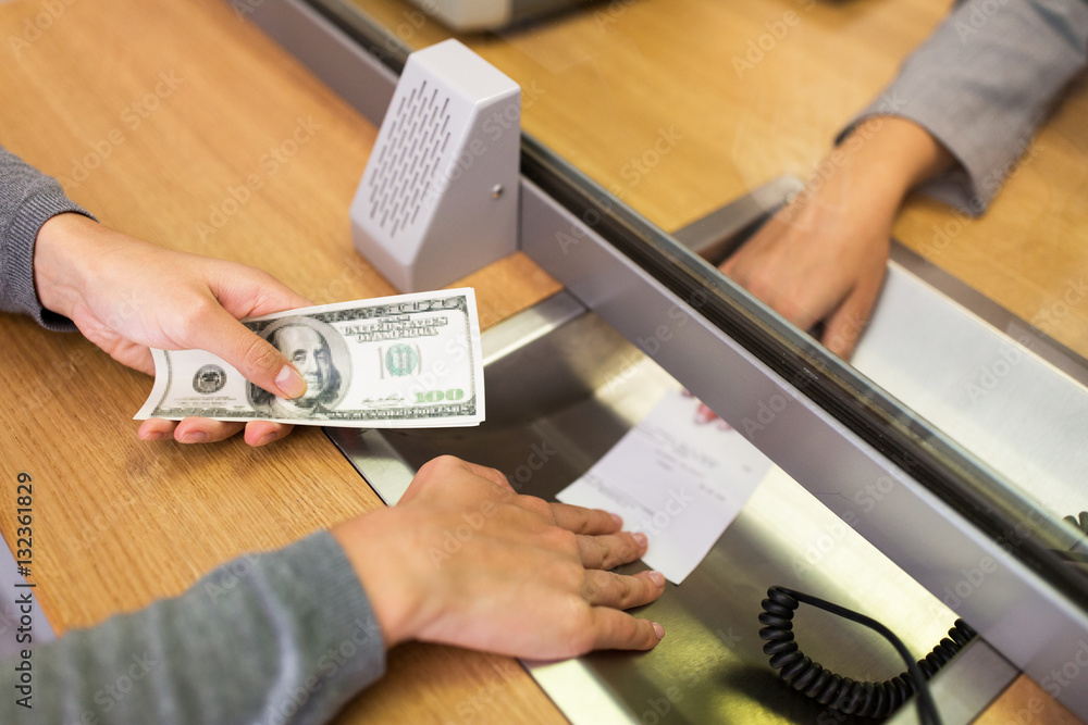 customer with money taking receipt from bank clerk Stock Photo | Adobe ...