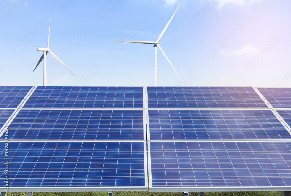 solar panels and wind turbines generating electricity in power station ...