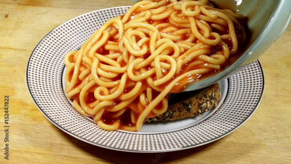 Tinned Spaghetti in Tomato Sauce on Toast Stock Video | Adobe Stock