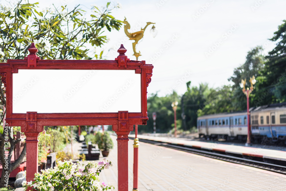Red blank board template in train station with public railway ...