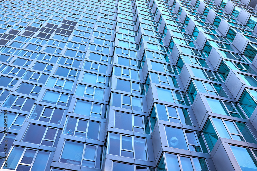Bay windows in a modern building facade with window sections of ...