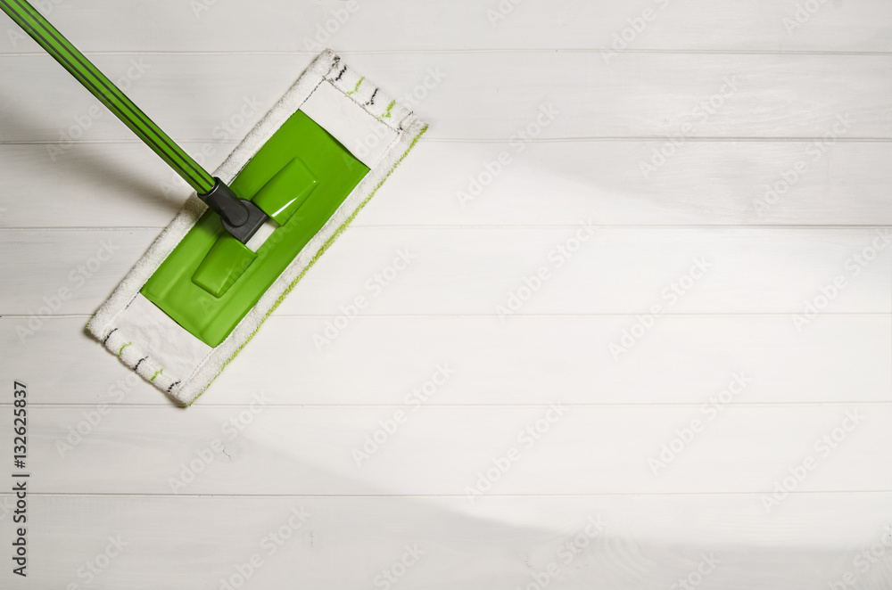 Cleaning floor with mop top view. Microfiber mop isolated on white ...