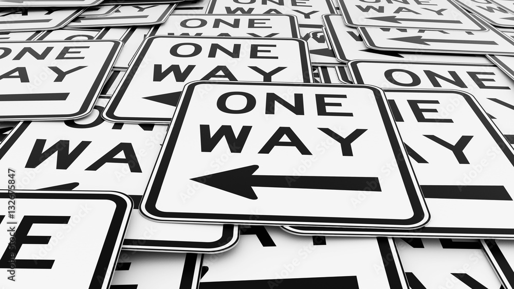 Large aligned pile of left point one way traffic signs. This image is a ...