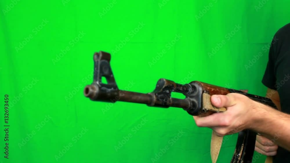 Man Turns Around And Shoots With Ak47 Stock Video | Adobe Stock