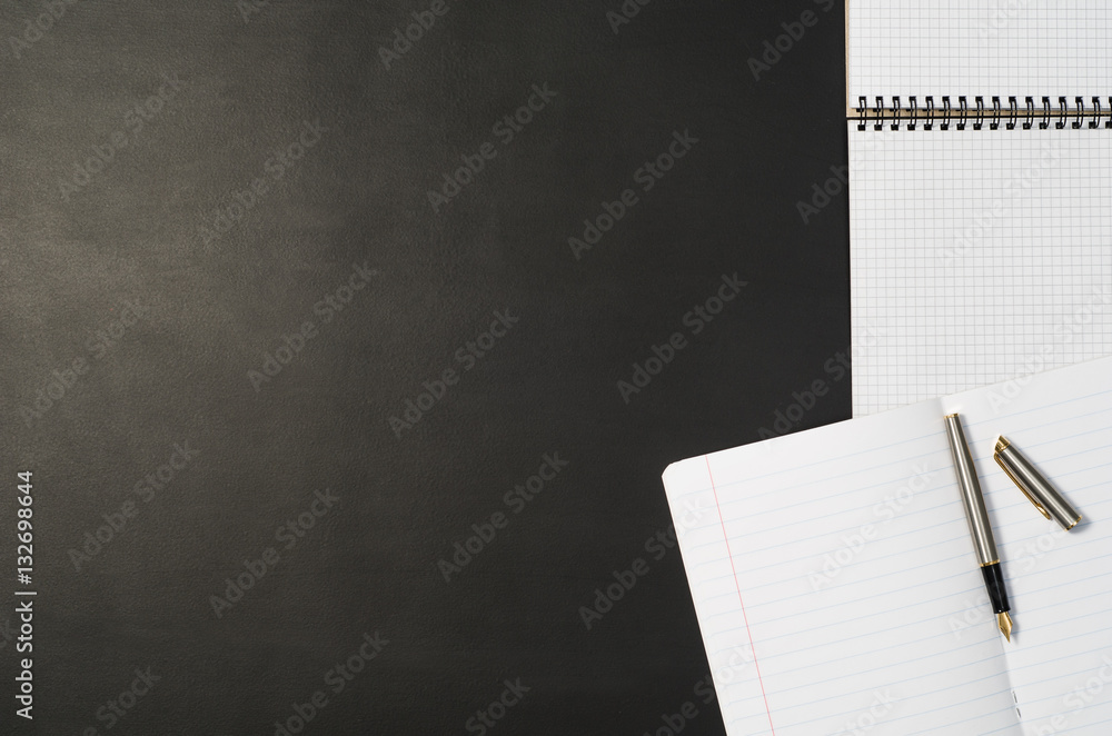 Black chalkboard office table or desk seen from above. Top view product ...