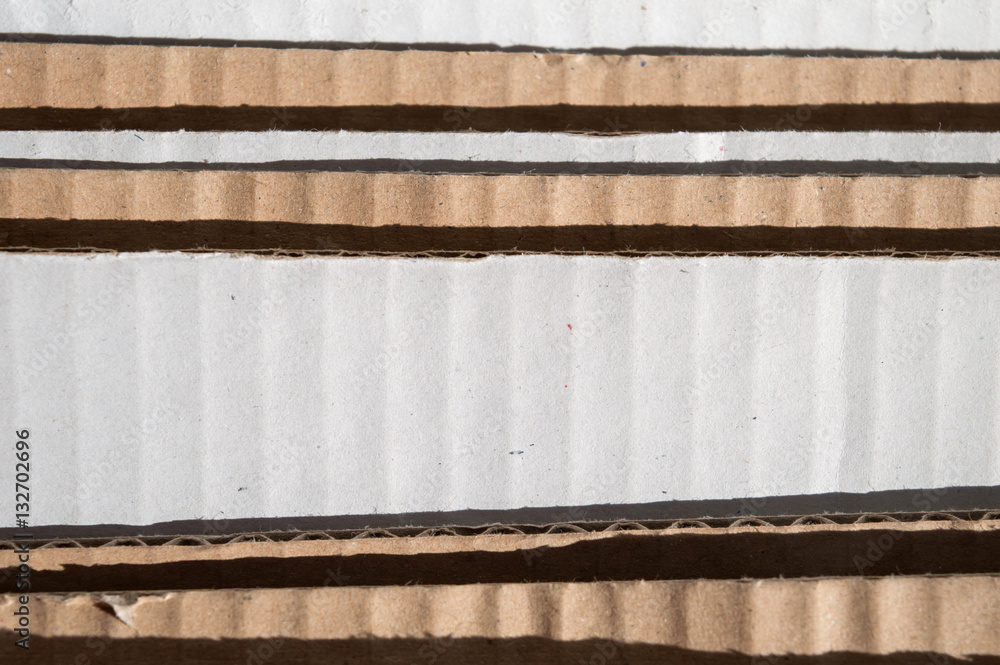 Texture of layered white brown cardboard side. Folded cardboard boxes ...