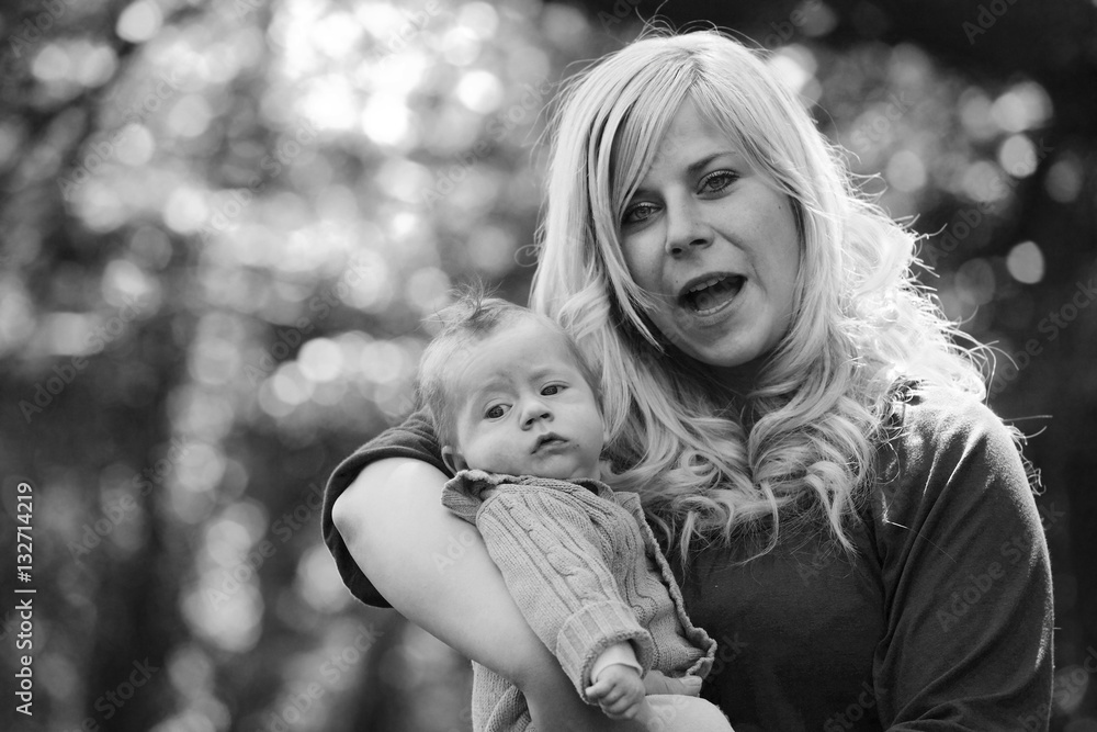 Angry mother defending her baby. Children abuse, domestic violence and ...