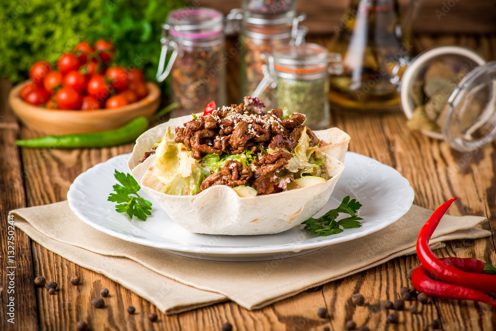 Doner kebab - fried chicken meat with vegetables in pita bread Stock ...