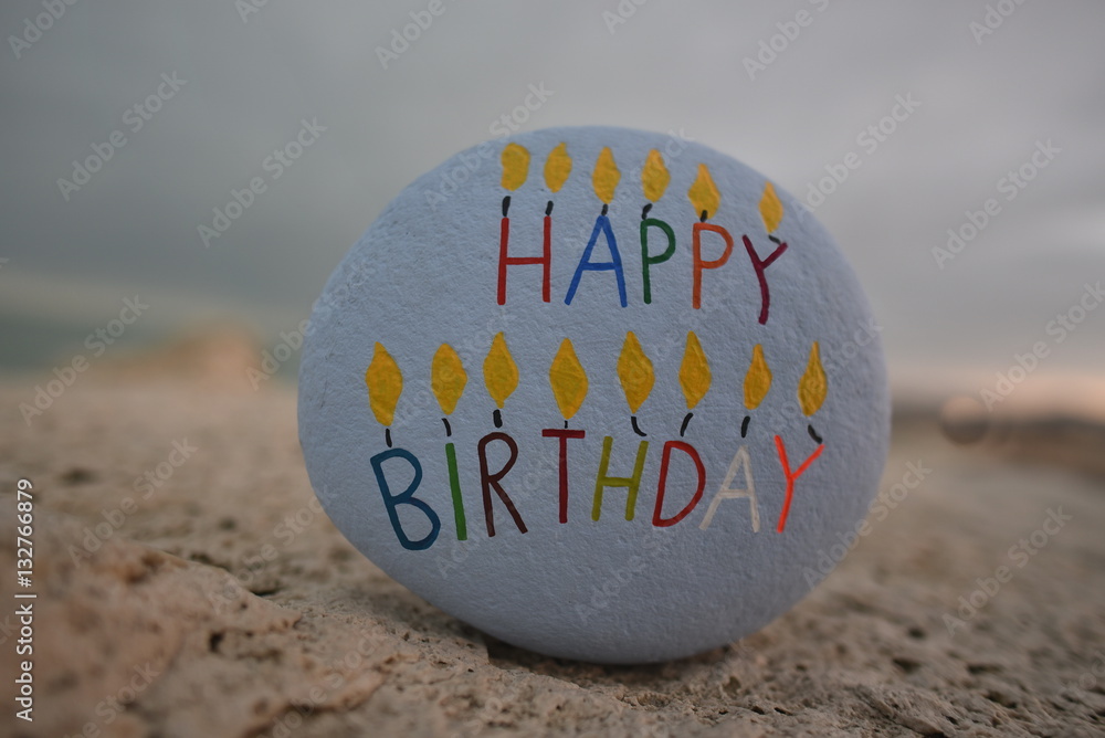 Happy Birthday carved and colored on a stone Stock Photo | Adobe Stock