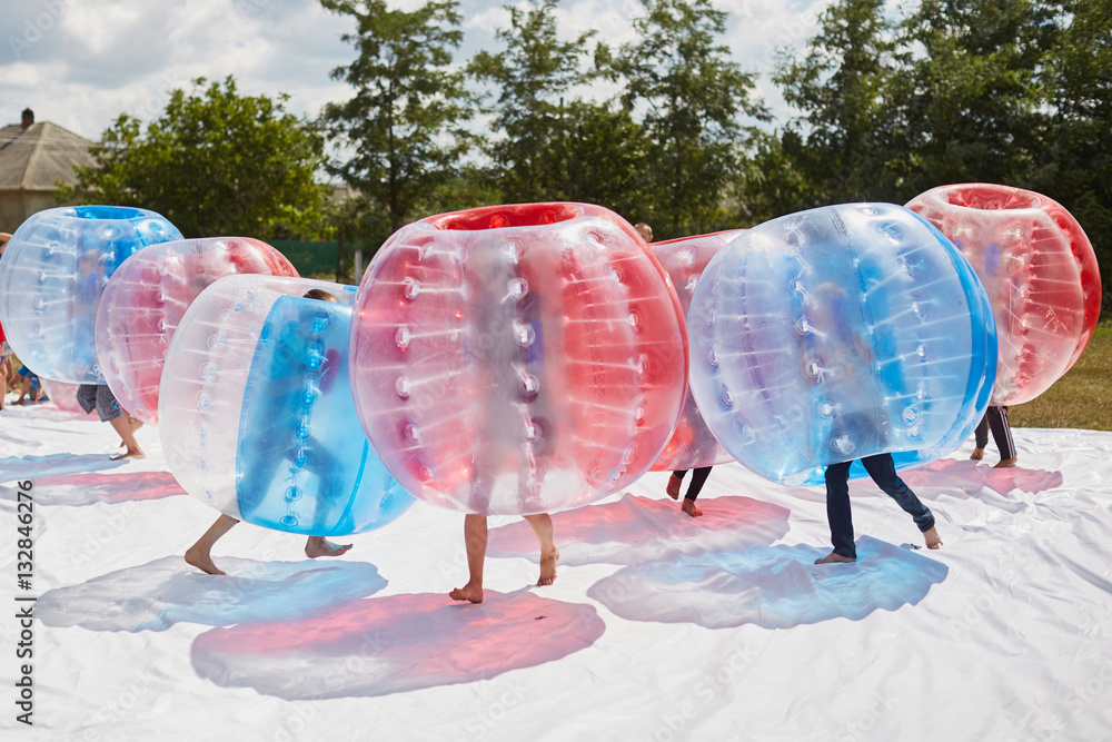 Bubble bump. Team game outdoor. Stock Photo | Adobe Stock