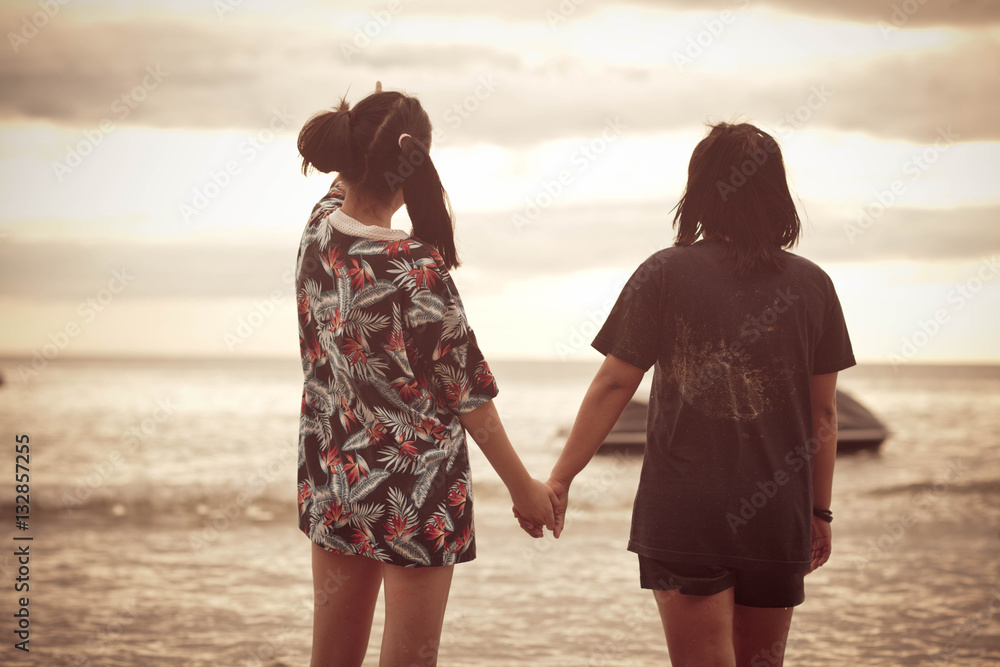 2 Friends Holding Hands