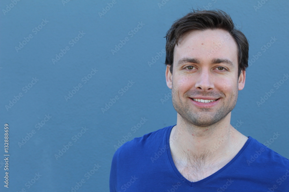 Smiling man over blue background Stock Photo | Adobe Stock