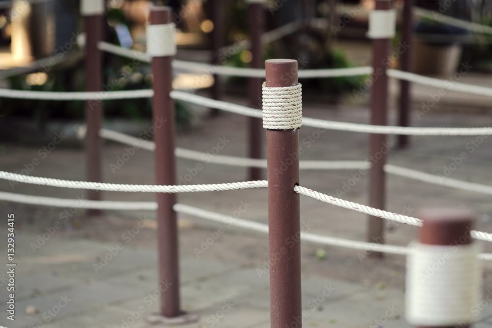 Rope on the pole for the shared corridor. Stock Photo | Adobe Stock