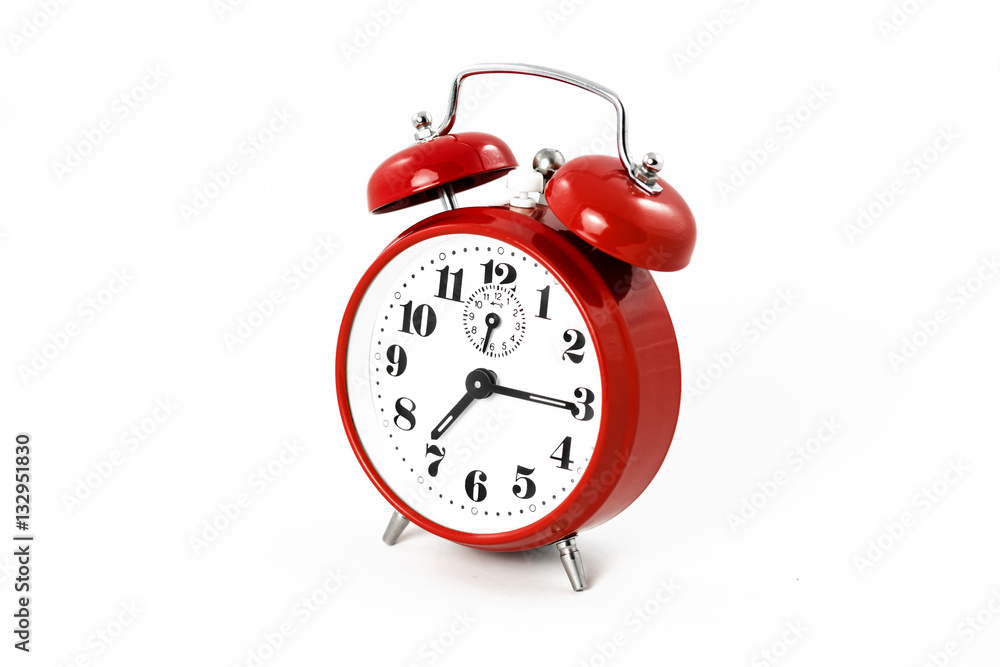 Round red alarm clock on white background isolated. The image of the ... Round red alarm clock on white background isolated. The image of the ...