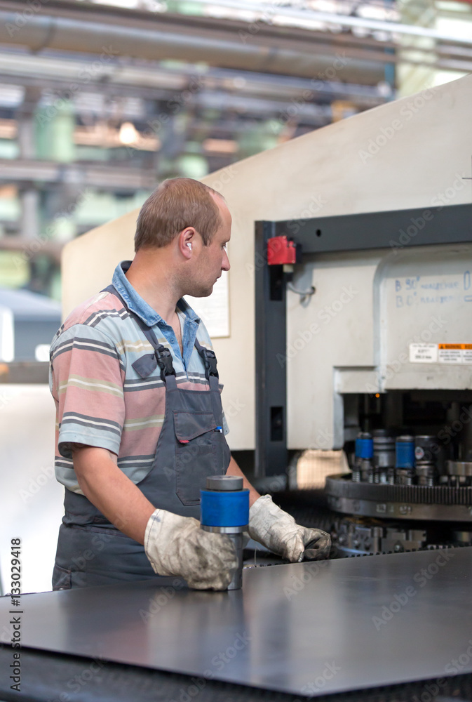 Factory Man Worker Operating Coordinate Punching Machine at Workshop ...