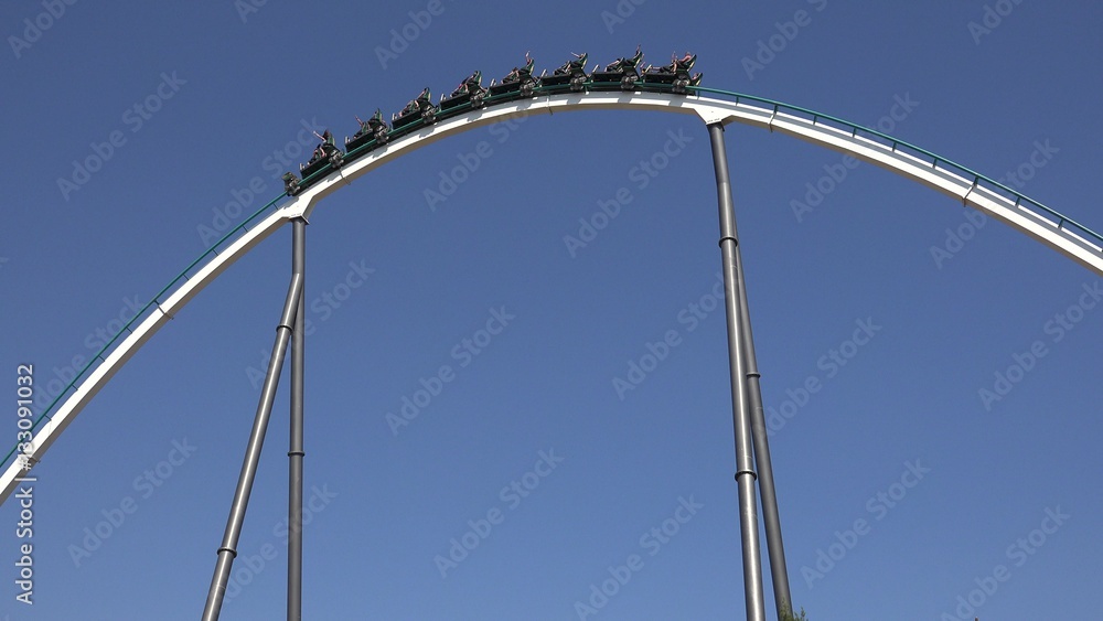 Exciting Theme Park Roller Coaster Ride Stock Photo | Adobe Stock