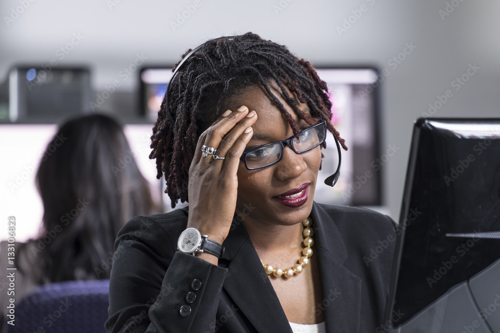 Customer service representative looking stressed Stock-Foto | Adobe Stock