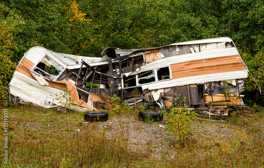 Broken and abandoned RV / trailer Stock Photo | Adobe Stock