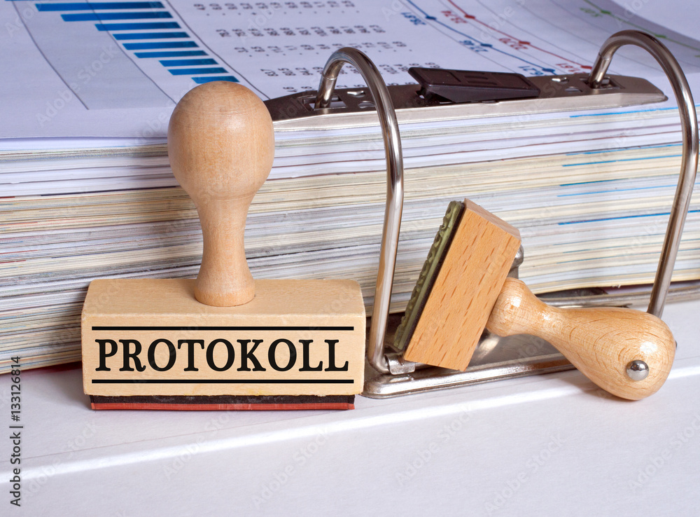 Protokoll Stempel im Büro mit Ordner und Akten Stock-Foto | Adobe Stock