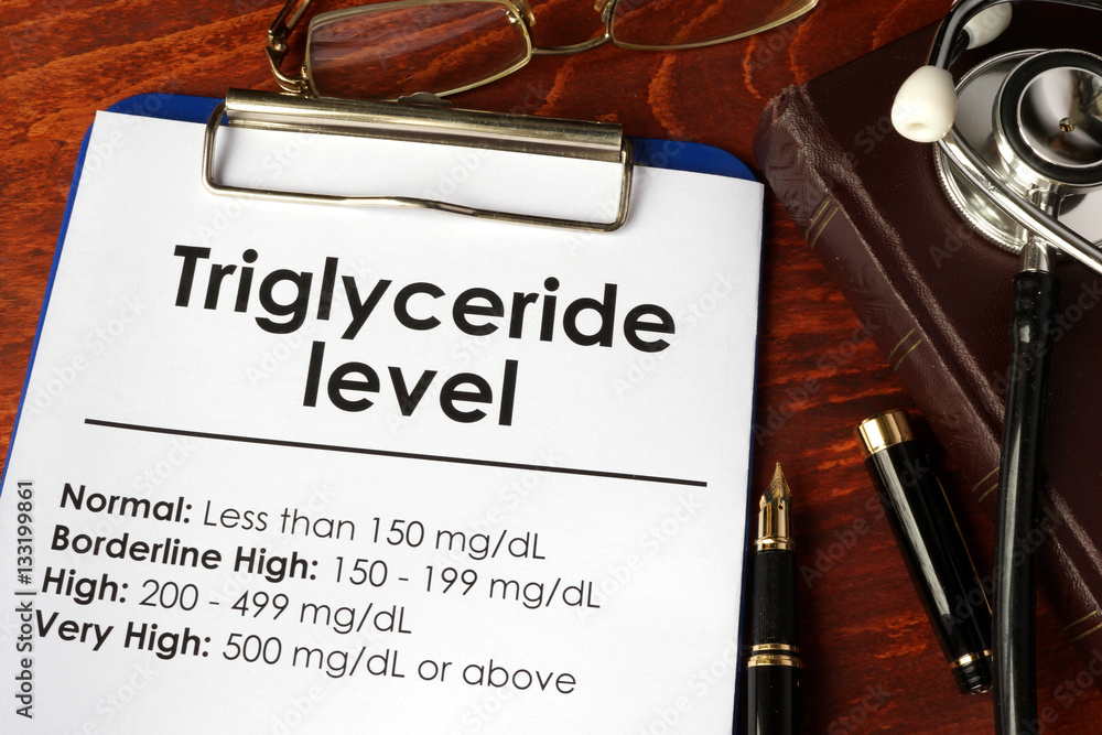 Triglyceride level chart on a table. Medical concept. Stock Photo ...