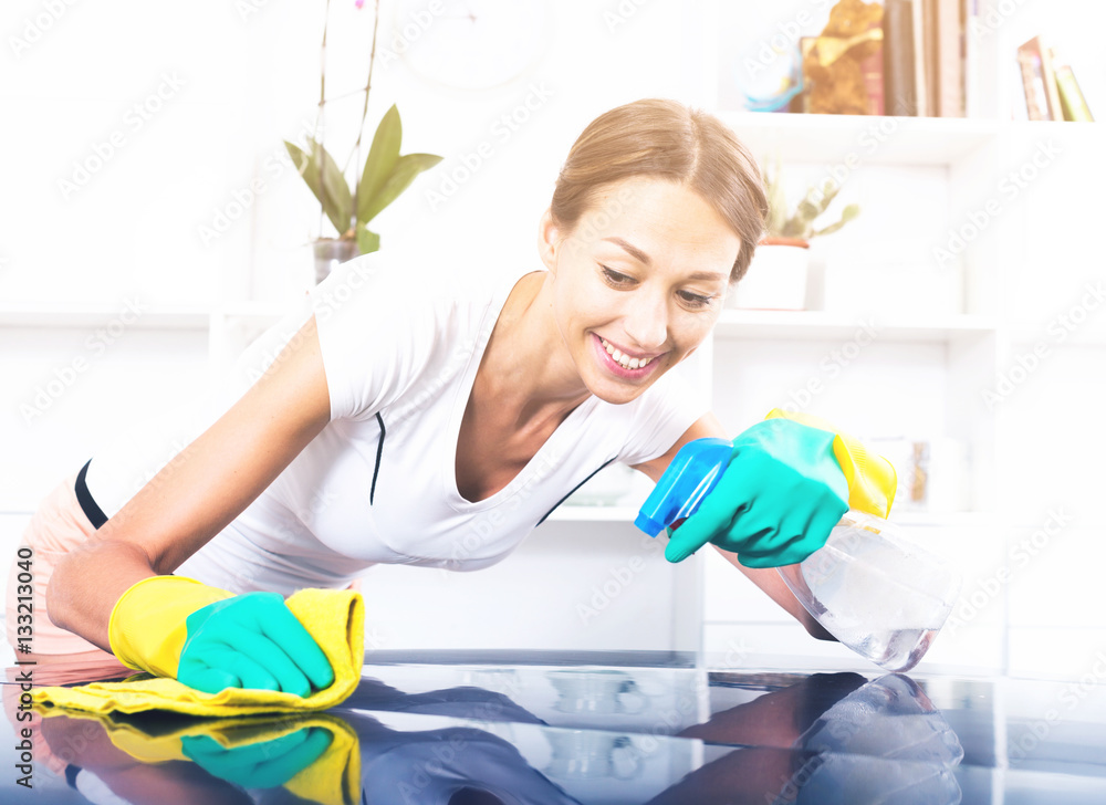woman cleaning home Stock Photo | Adobe Stock
