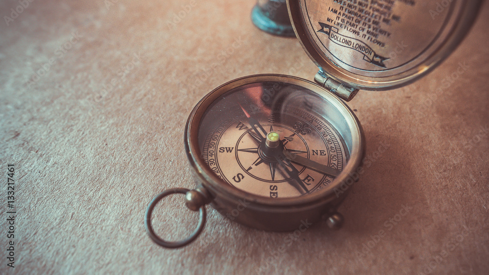 Old compass collection on brown paper background in vintage style ...