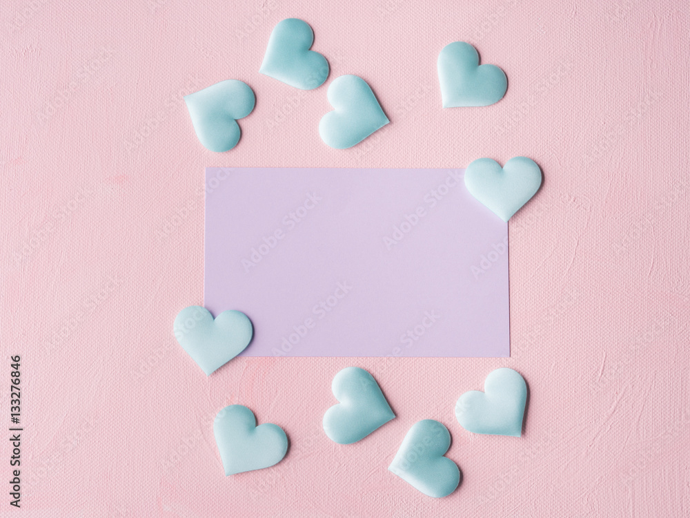 Pastel color card on pink textured background. Baby birthday party ...