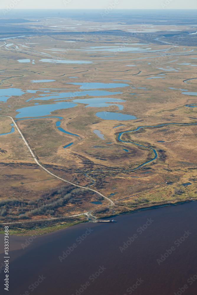 ferryboat at the bank of river, top view Stock Photo | Adobe Stock