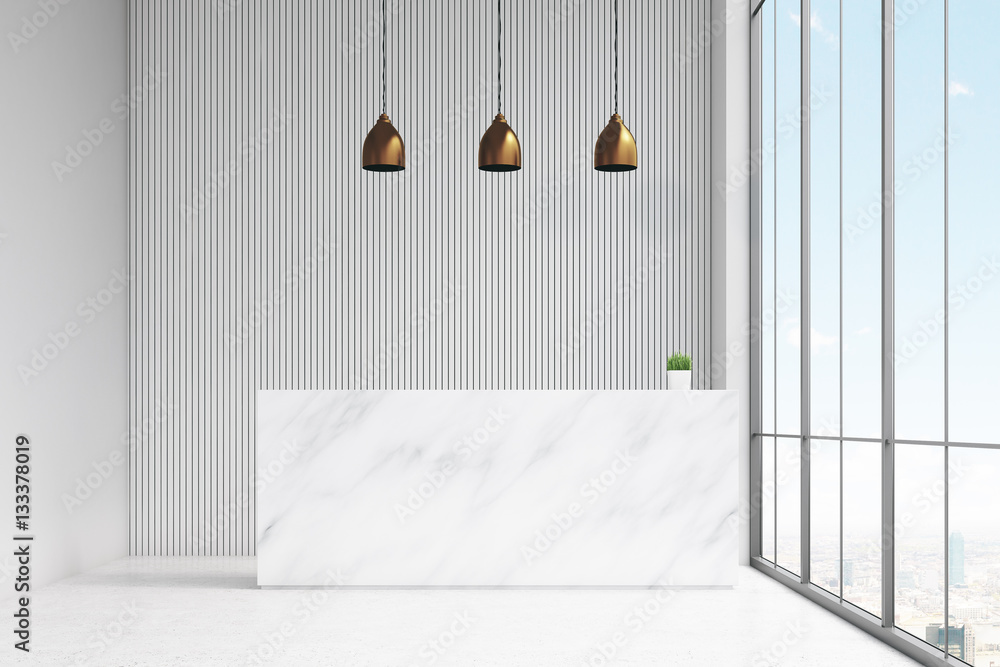 Front view of a white reception desk standing in an office hall. There ...