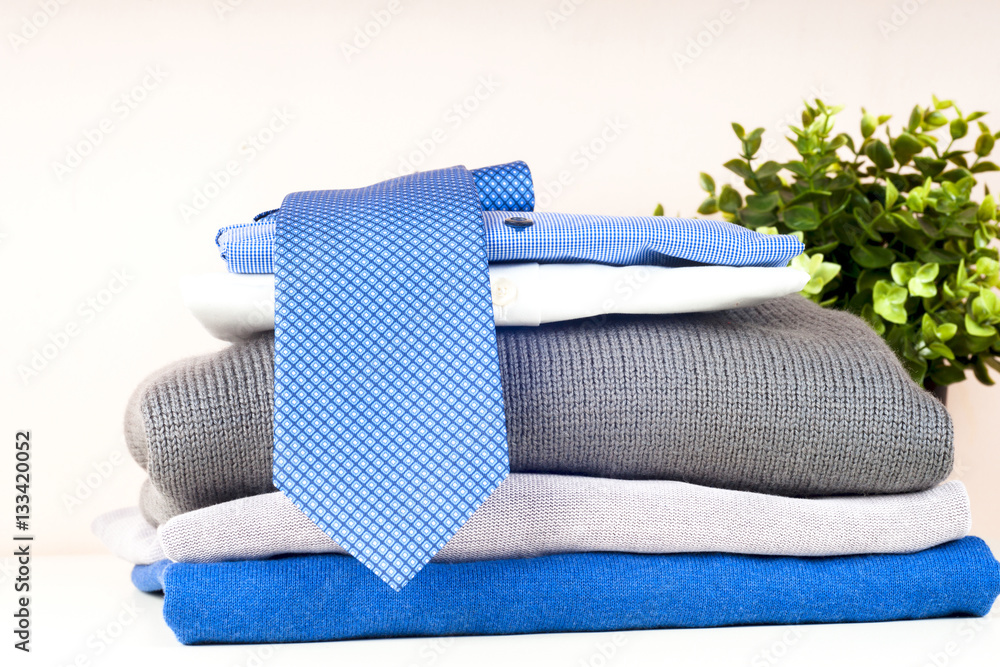 stack of clothing isolated on white Stock Photo | Adobe Stock