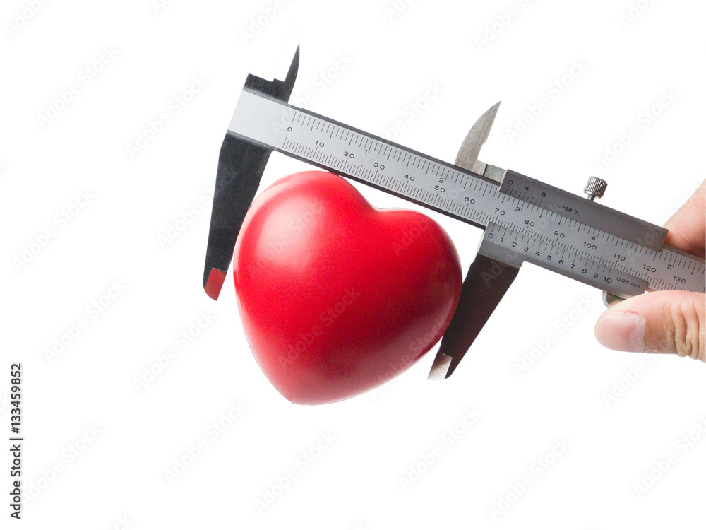 Isolate Hands hold the vernier caliper to measure heart , In concept ...