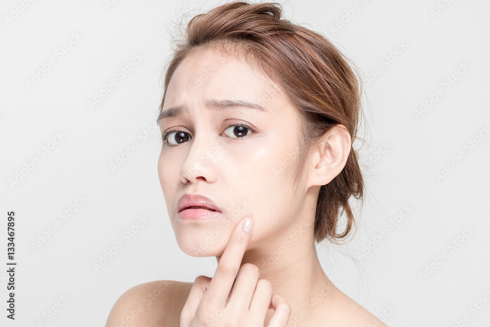 beauty girl of half latina and half asian who checks her skin, skin ...