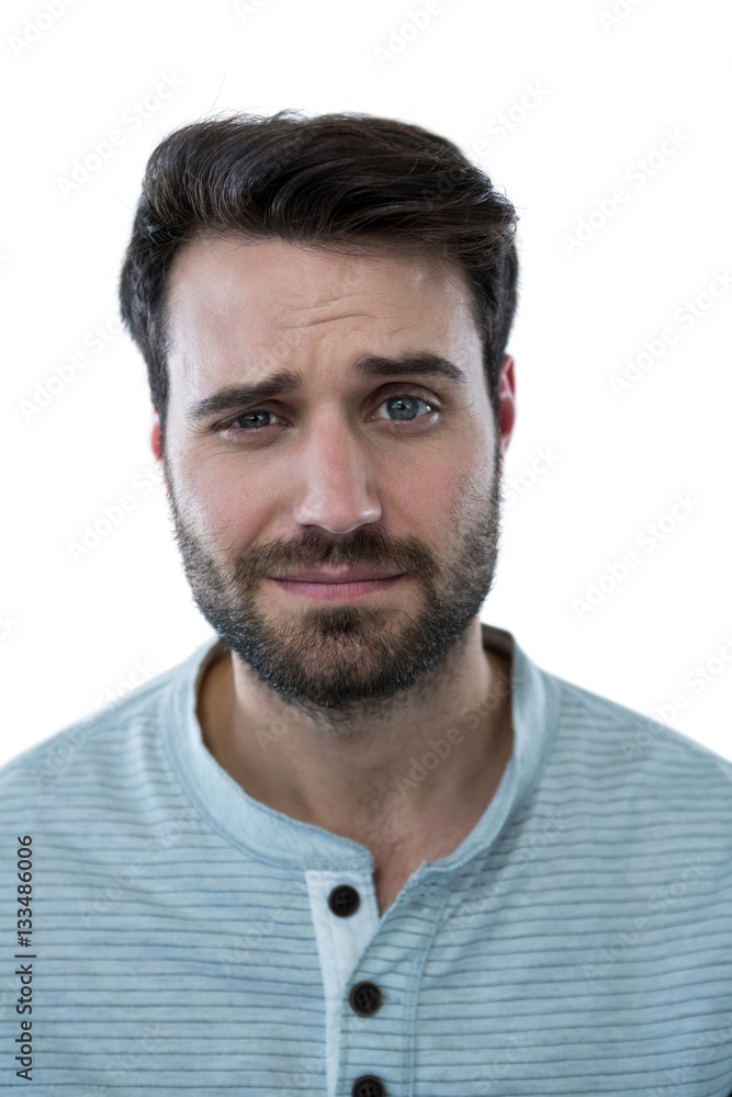 Man frowning Stock Photo | Adobe Stock