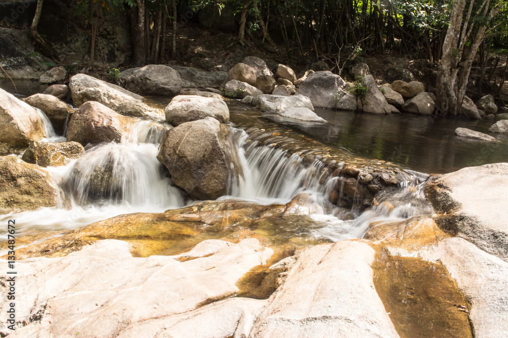 Nine dives waterfall falls from a cliff in the Central Valley ...