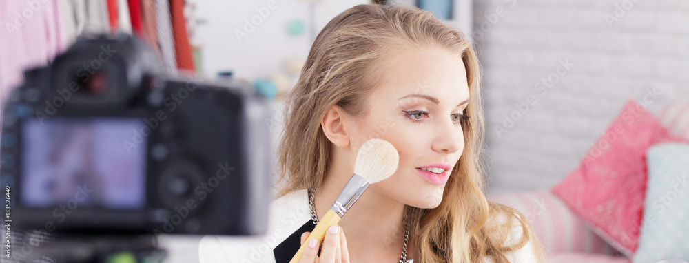 Girl doing make up Stock Photo | Adobe Stock