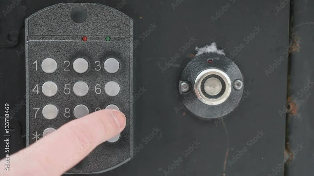 The person opening the entrance door using a numeric code of access Stock Video | Adobe Stock