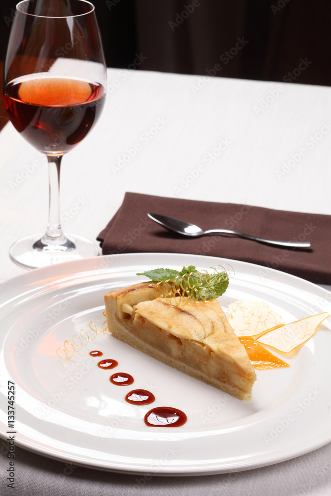 Fine dining - apple pie with glass of wine Stock Photo | Adobe Stock