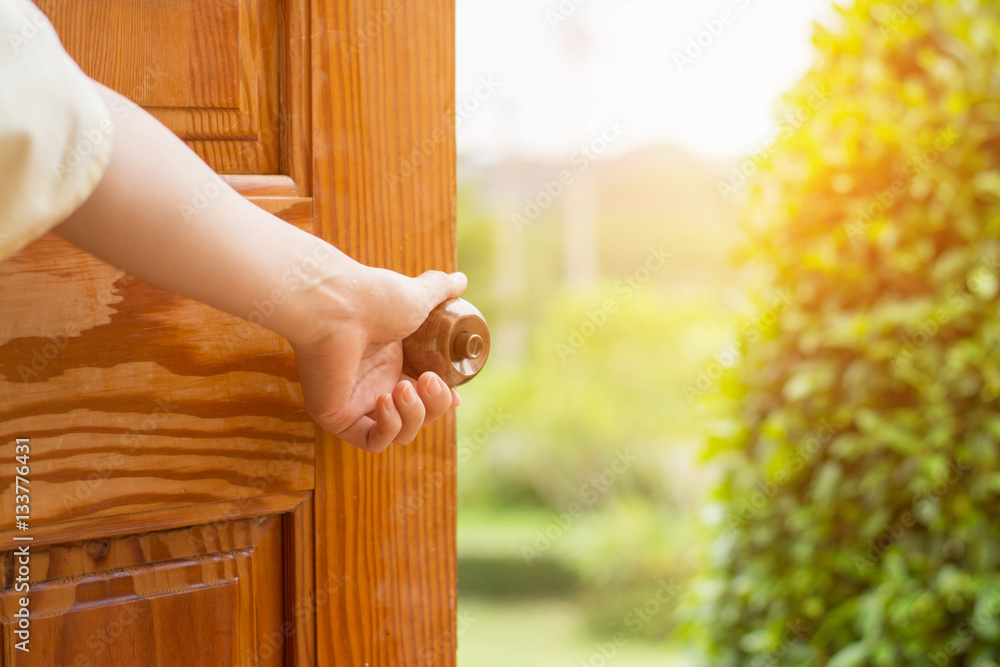 Women hand open door knob or opening the door. Stock-Foto | Adobe Stock